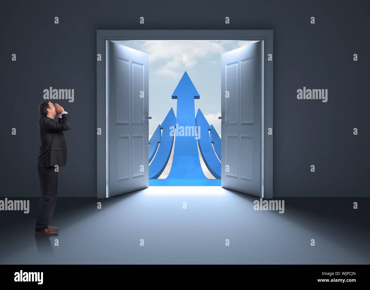 Shouting businessman against door opening to show red arrow Stock Photo ...