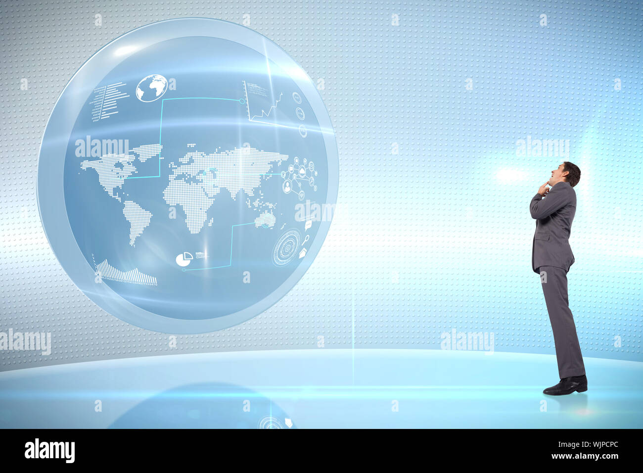 Thinking businessman with hand on chin against futuristic technology ...