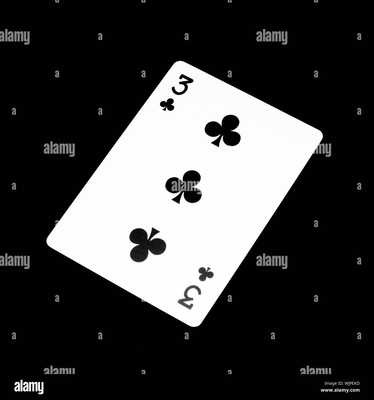 number three clover card isolated on black Stock Photo - Alamy