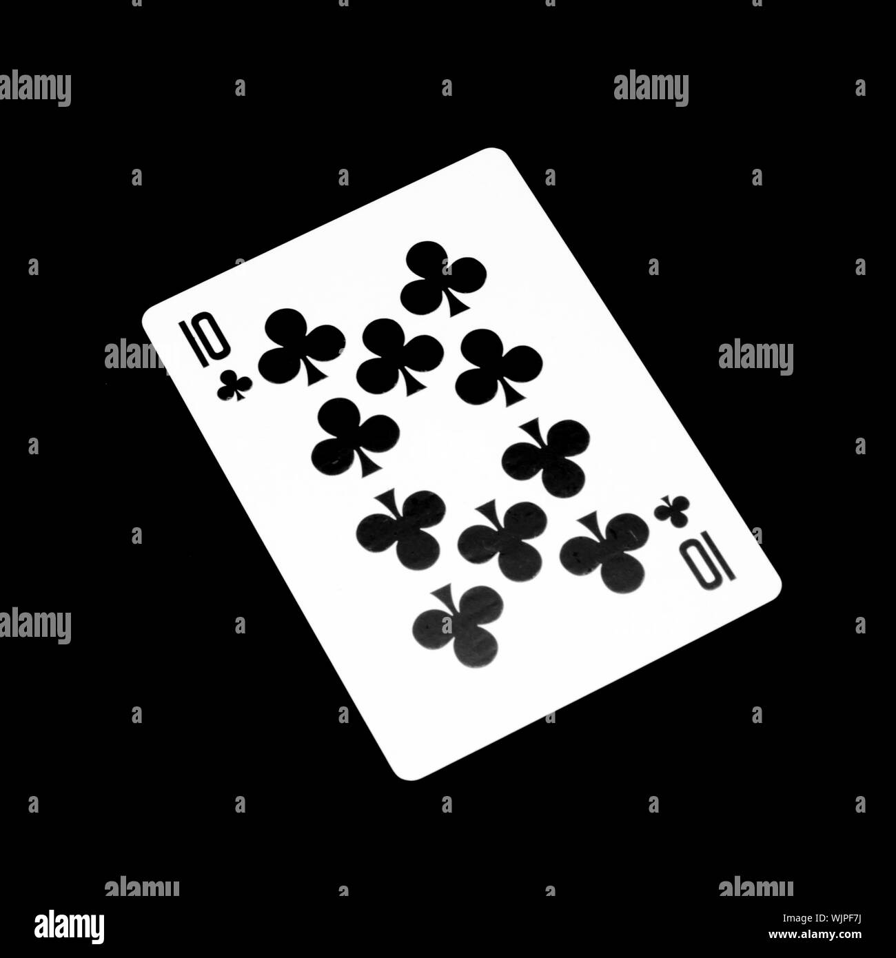 number ten clover card isolated on black background Stock Photo - Alamy