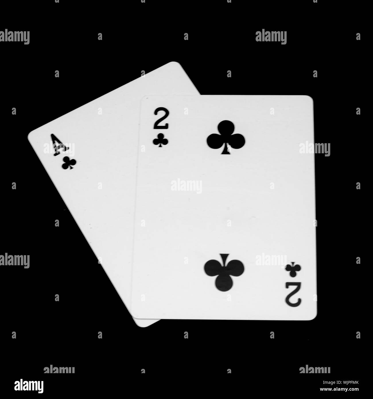 ace and number two clover card isolated on black background Stock Photo ...