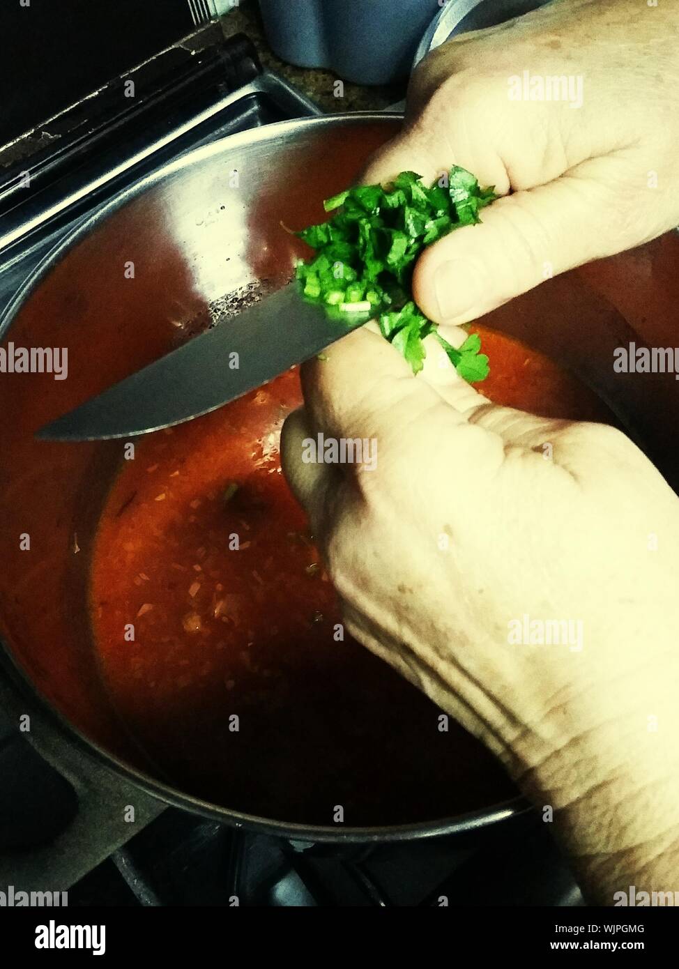 Cutting two hi-res stock photography and images - Alamy