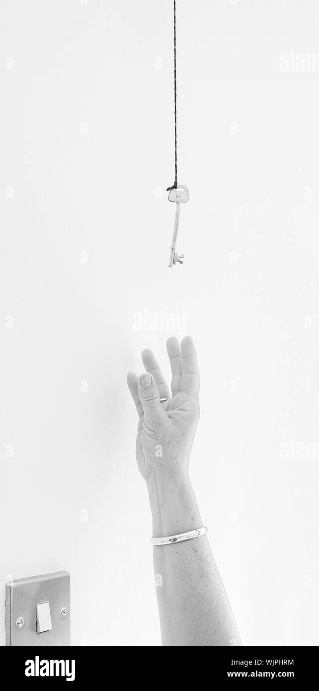 Hand reaching out for switch hi-res stock photography and images - Alamy