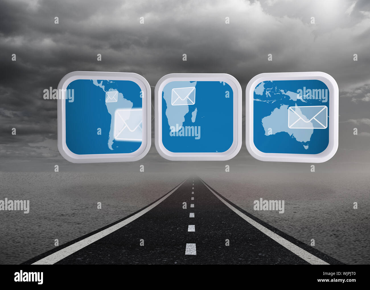 World map and email on abstract screen against highway through stormy ...