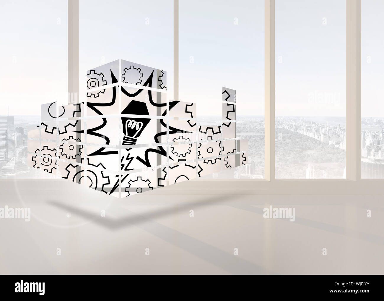 Light bulb on abstract screen against bright white room with windows ...