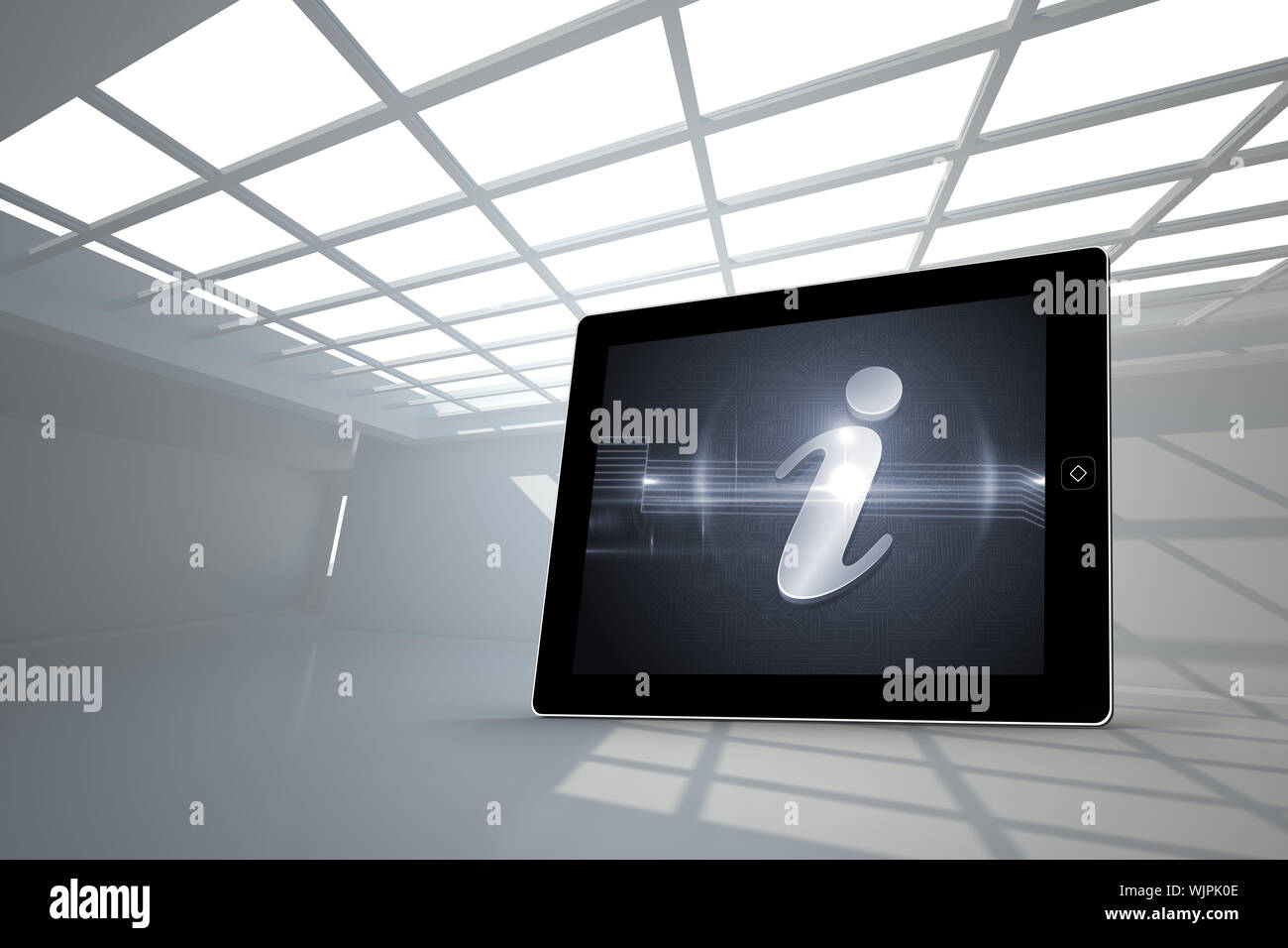 Information sign on tablet screen against white room with windows at ...