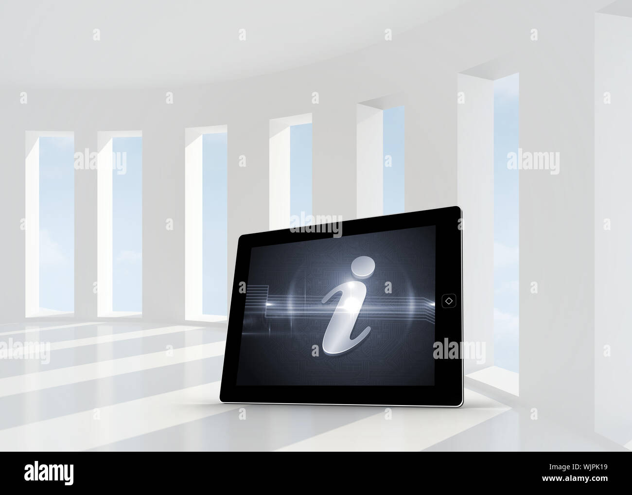 Information sign on tablet screen against bright white room with ...