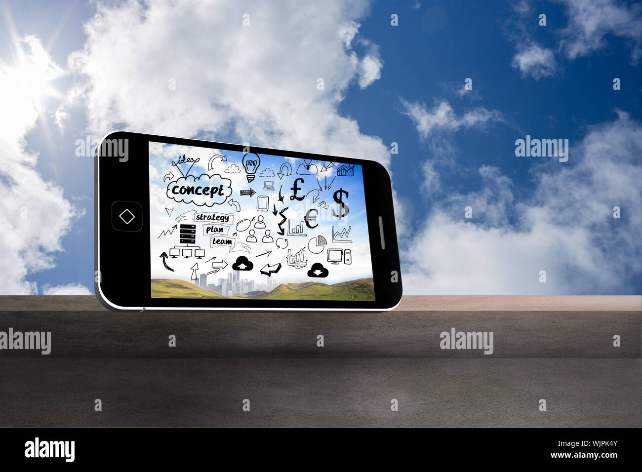 Brainstorm on smartphone screen against street under cloudy sky Stock ...