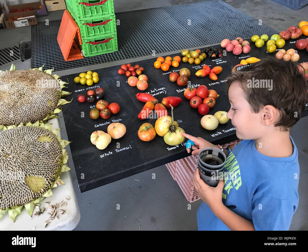 Boy at the market hi-res stock photography and images - Alamy