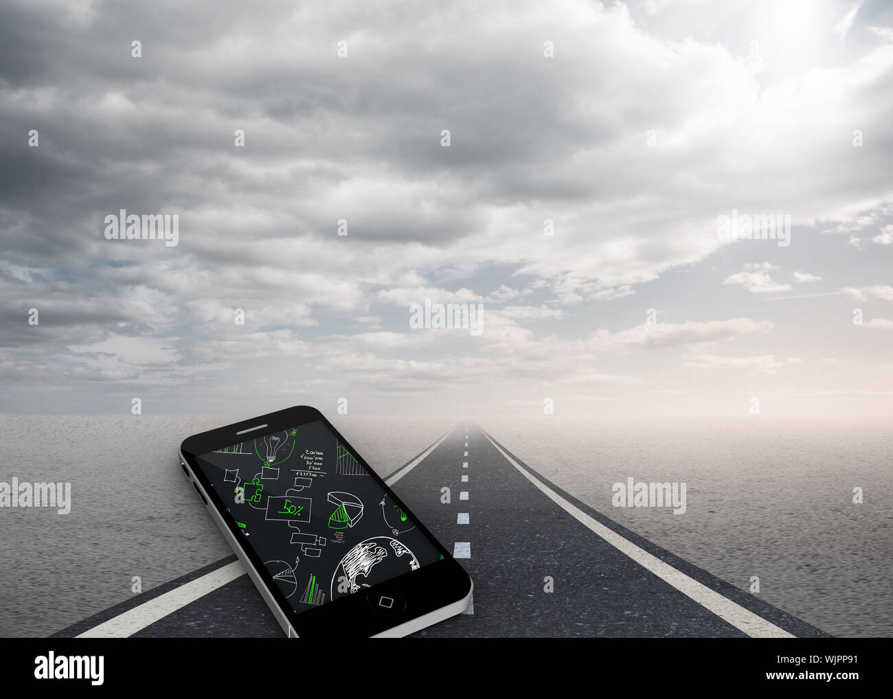 Brainstorm on smartphone screen against street under cloudy sky Stock ...