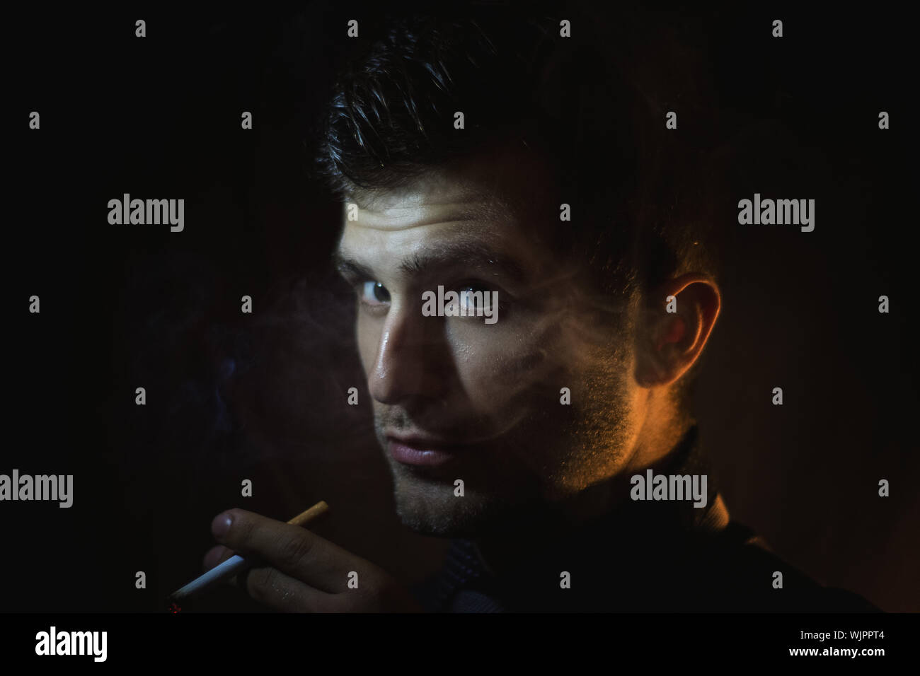 Cigarette smoke smoking light up hi-res stock photography and images ...