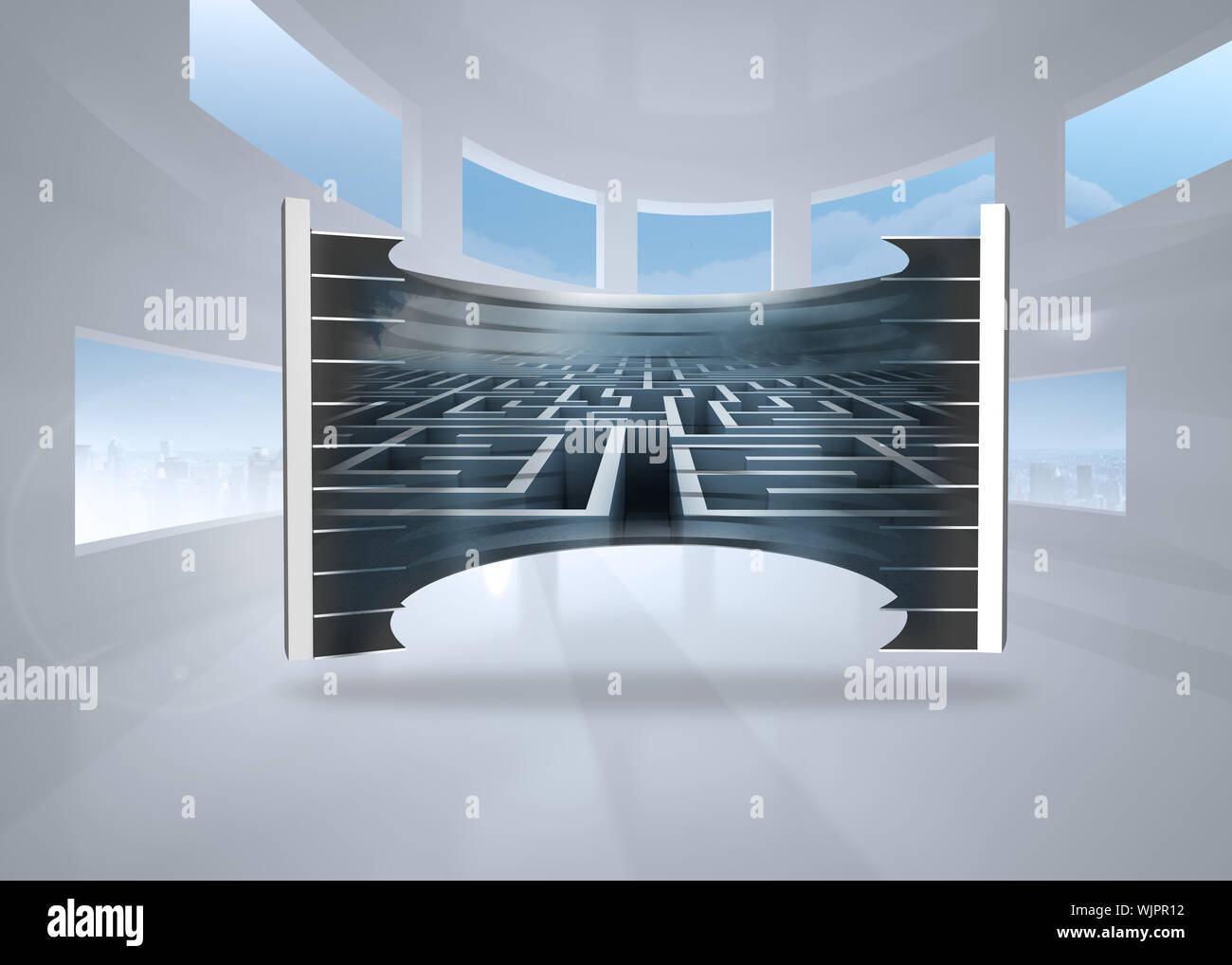Maze on abstract screen against bright white room with windows Stock ...