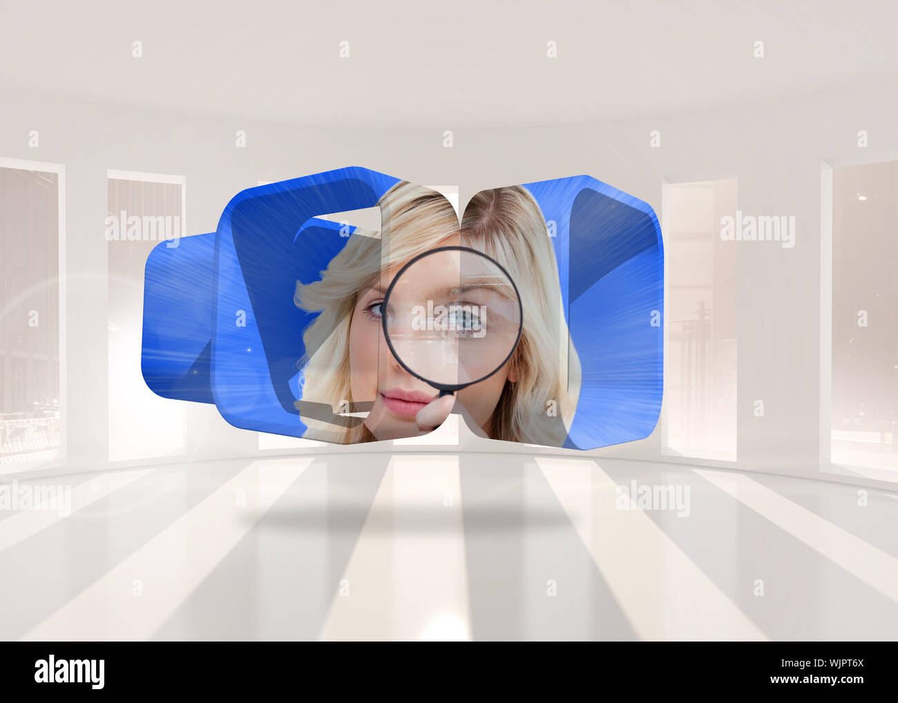 Blonde holding magnifying glass on abstract screen against bright white ...