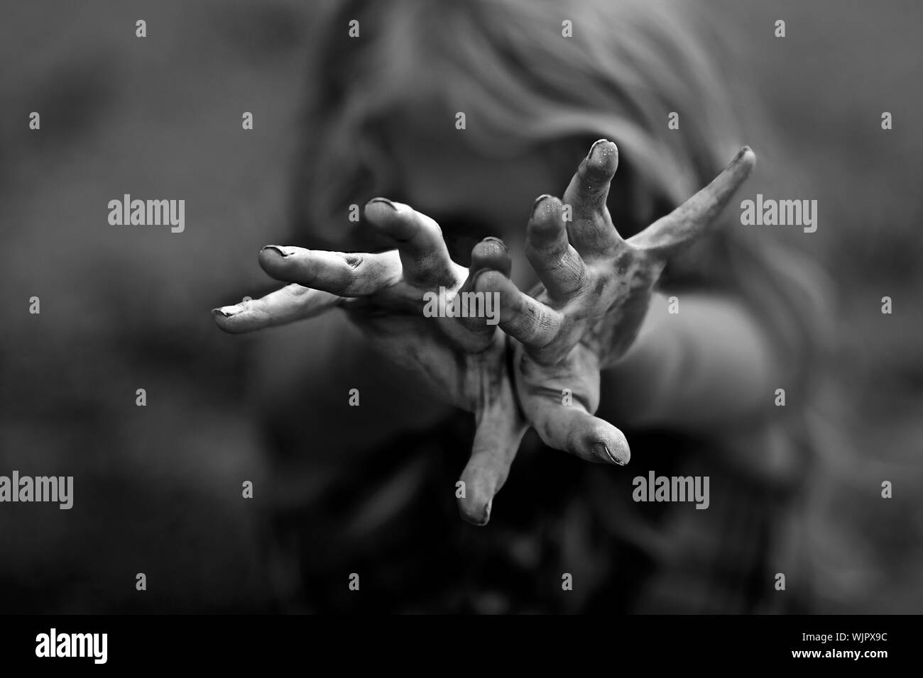 Girl showing her dirty hands hi-res stock photography and images - Alamy