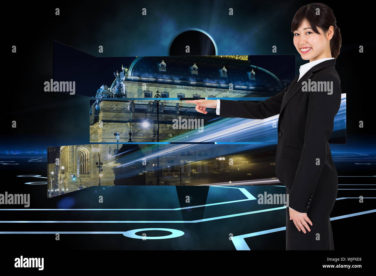 Smiling businesswoman pointing against keyhole on technological black background Stock Photo - Alamy