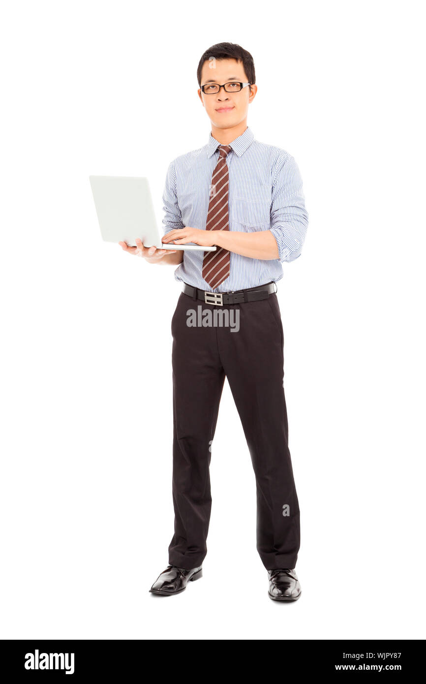 professional computer engineer standing and holding the laptop Stock ...