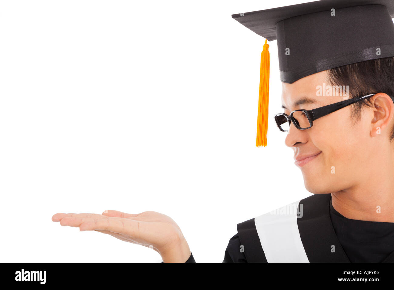 smiling graduation student focus on his hand Stock Photo - Alamy