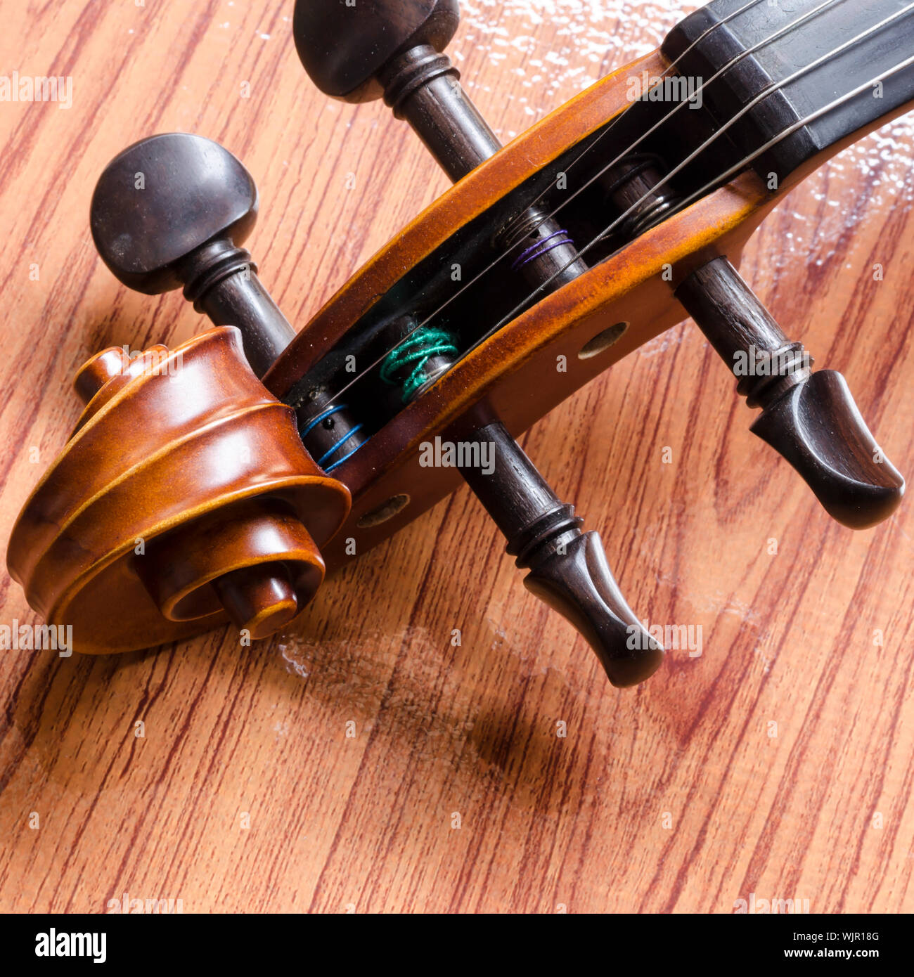 string instrument "violin" on wood background Stock Photo - Alamy