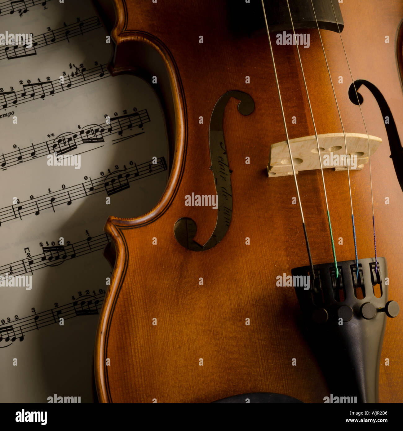 "time to practice violin" violin with sheet music on vintage style ...
