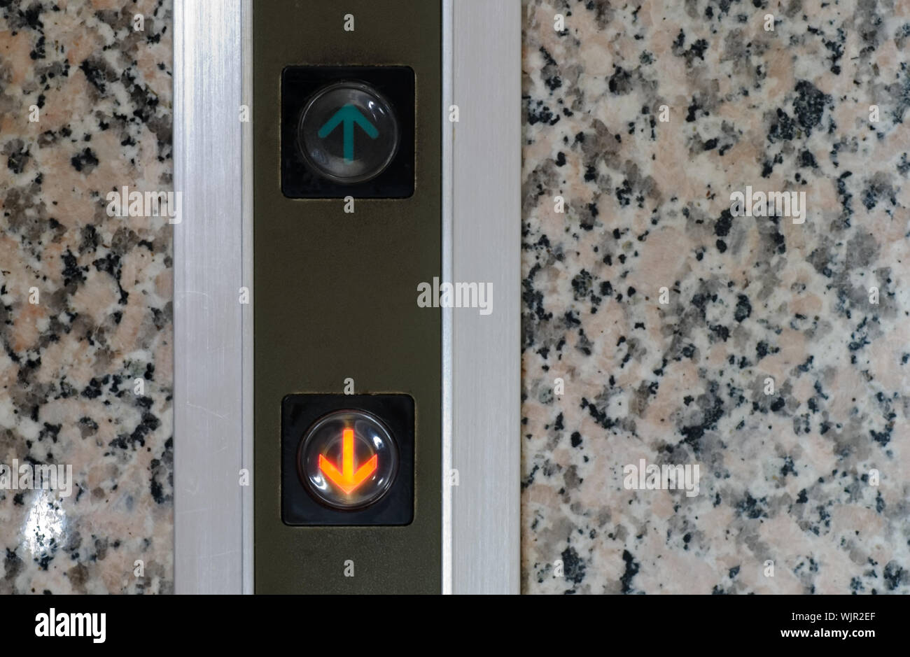 it is the elevator button of down sign Stock Photo - Alamy