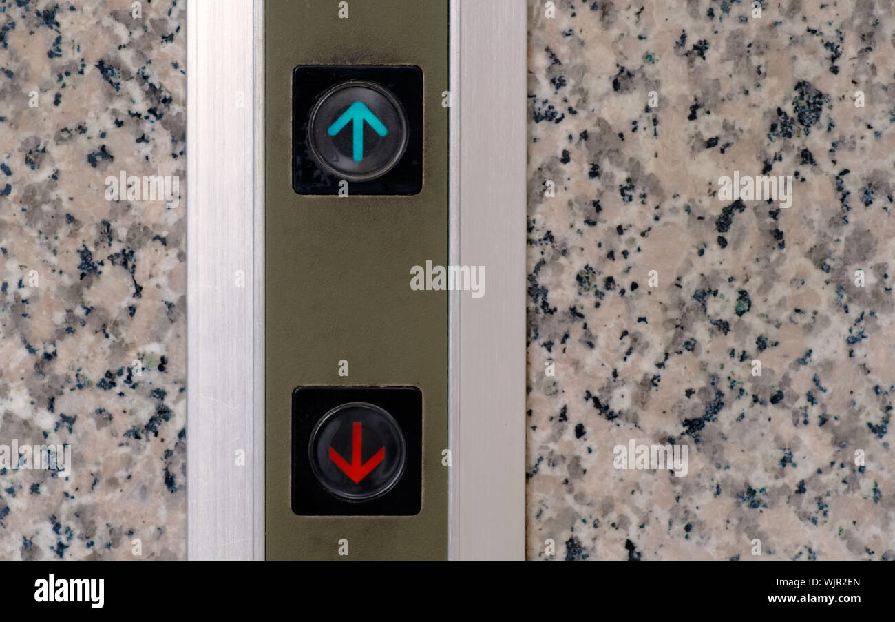 Here are elevator button of up and down signs Stock Photo - Alamy