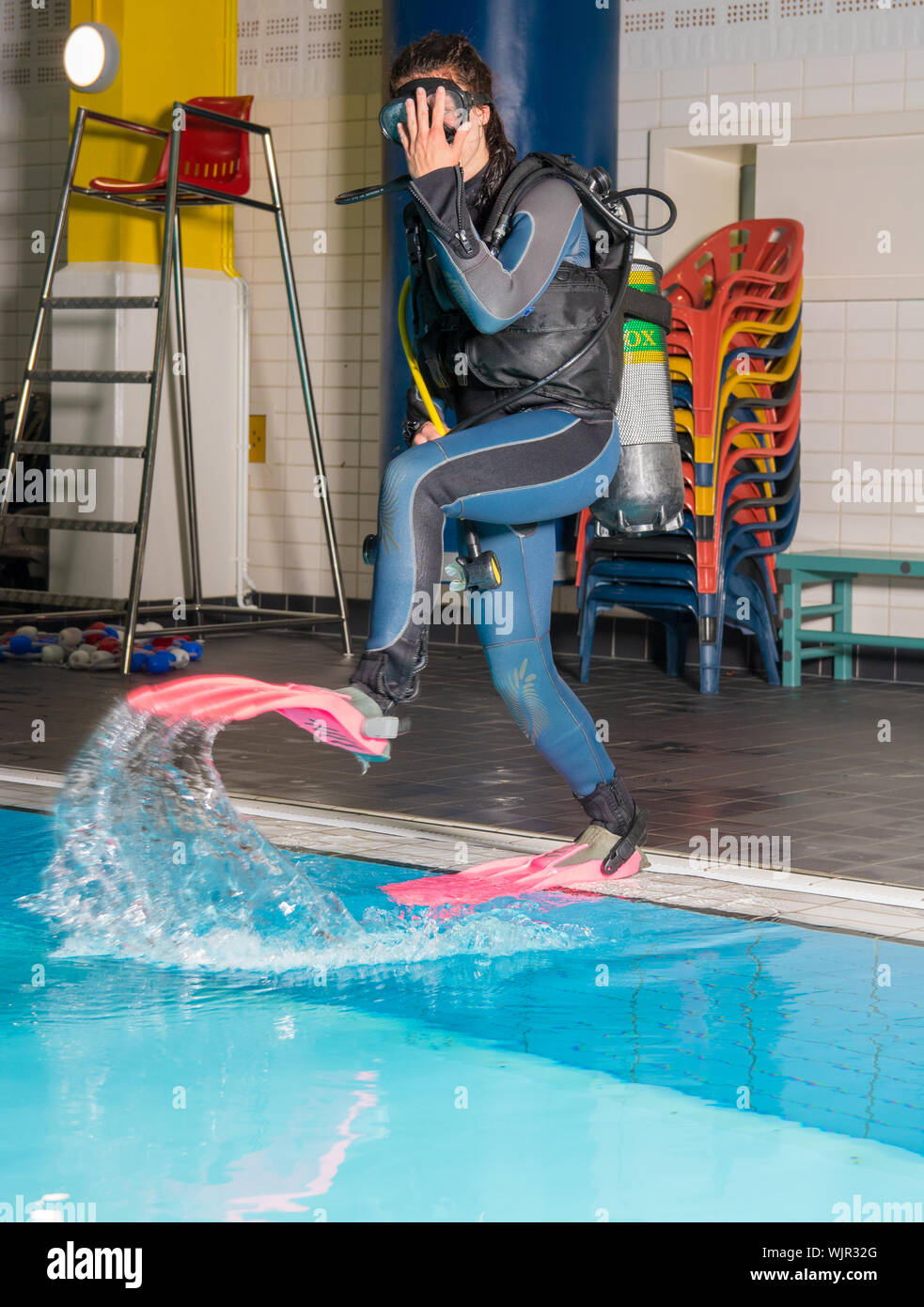 Full Length Of Man Scuba Diving In Swimming Pool Stock Photo - Alamy