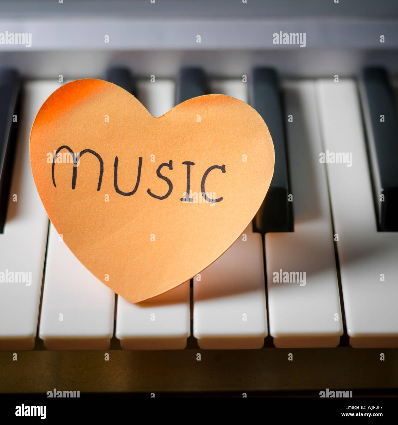 heart on key piano say love music Stock Photo - Alamy