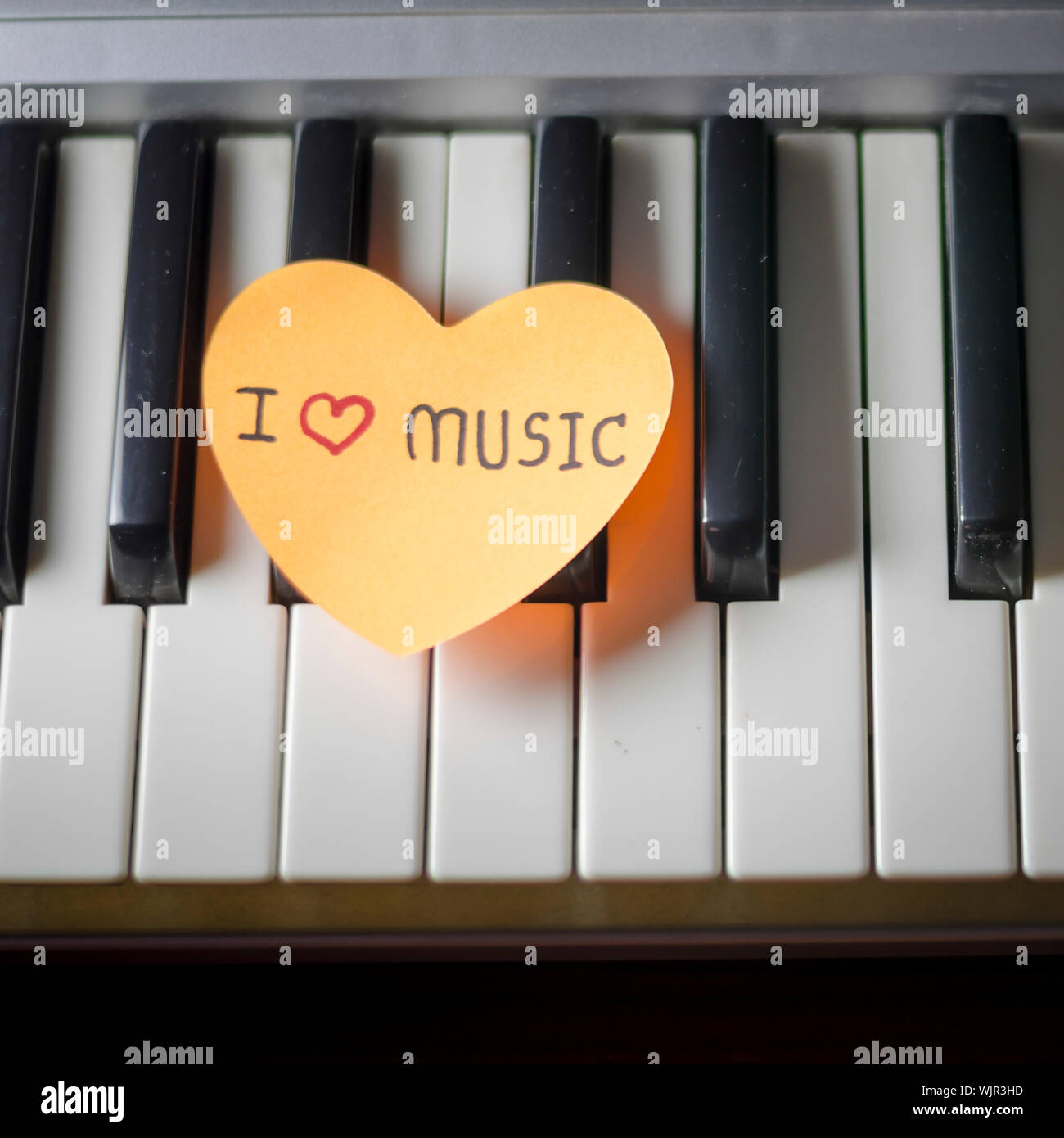 heart on key piano say love music Stock Photo - Alamy