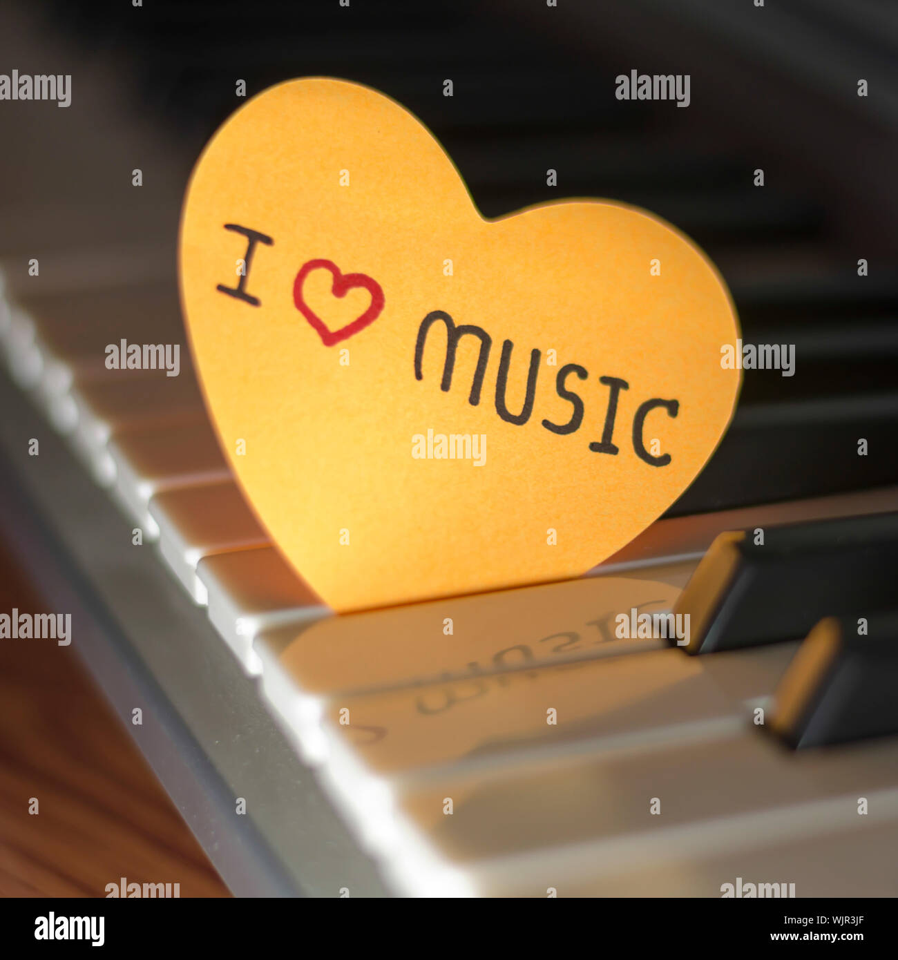 heart on key piano say love music Stock Photo - Alamy