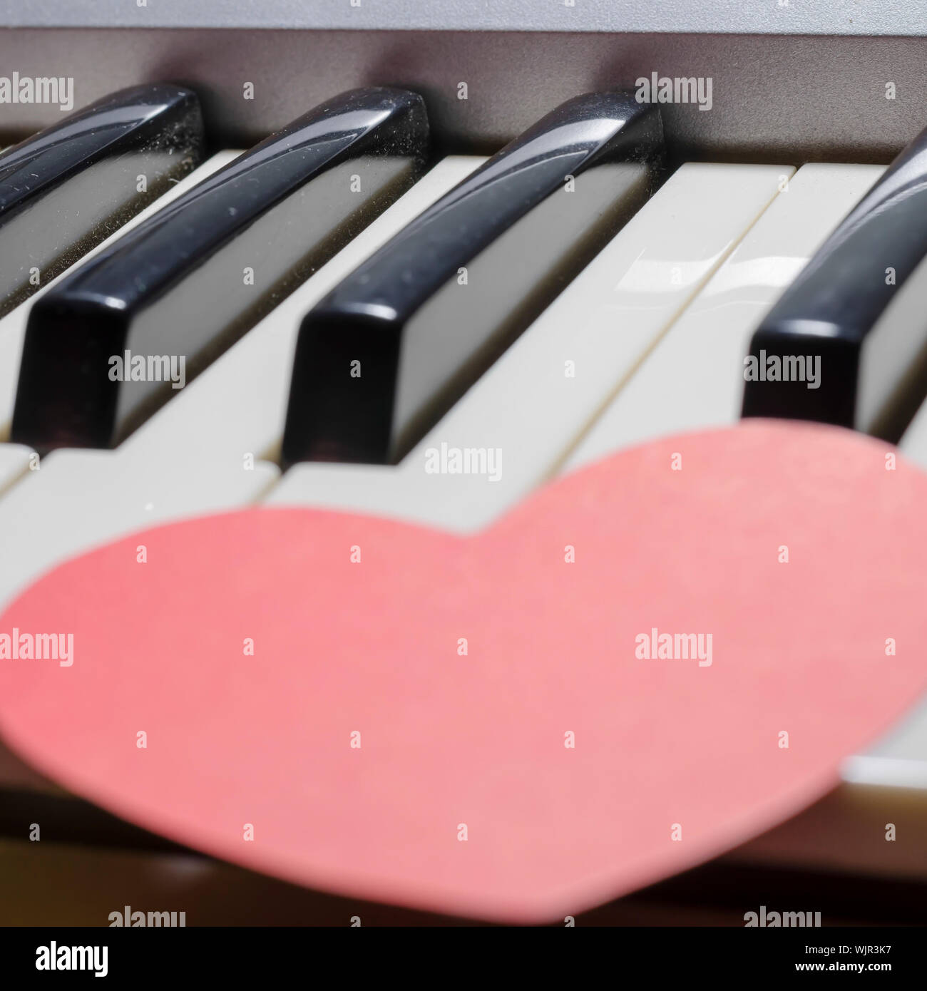 heart on key piano say love music Stock Photo - Alamy