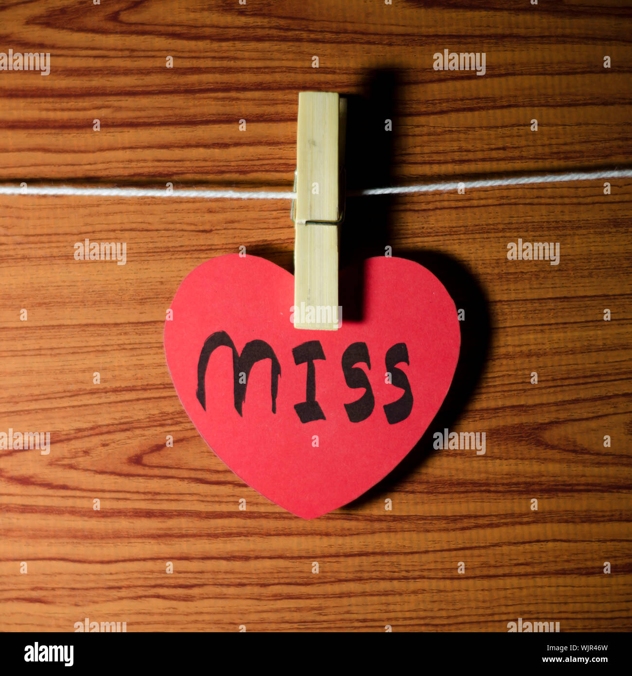 red heart word miss on wood vintage stlye background Stock Photo - Alamy