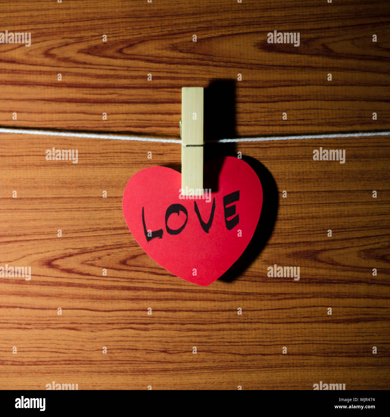 red heart word LOVE on wood vintage stlye background Stock Photo - Alamy