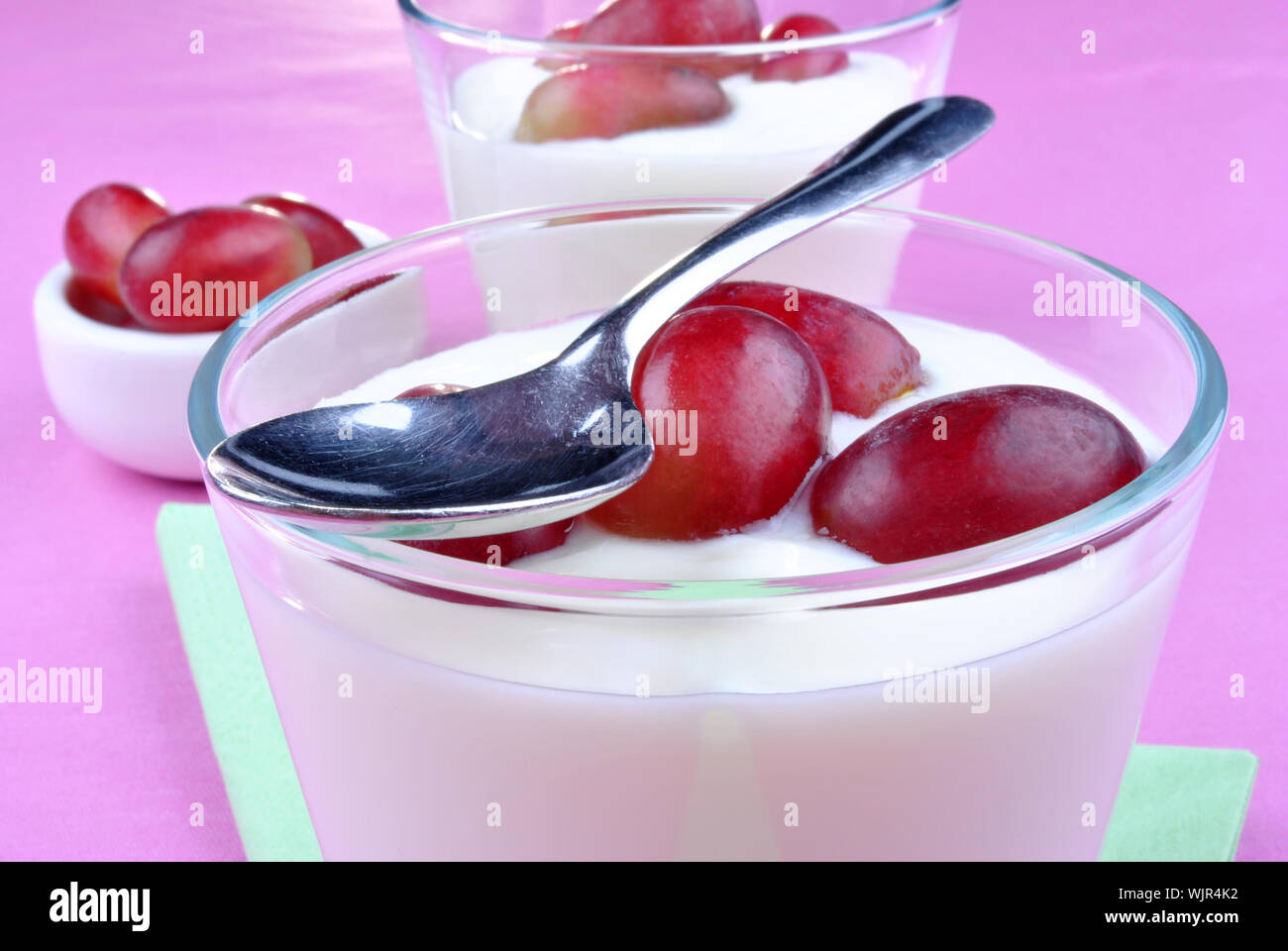 organic fruit with natural yoghurt in a glass Stock Photo - Alamy