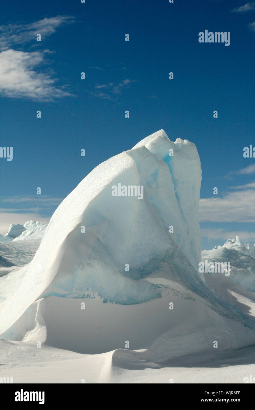 Iceberg frozen solid in the sea ice of Antarctica Stock Photo - Alamy