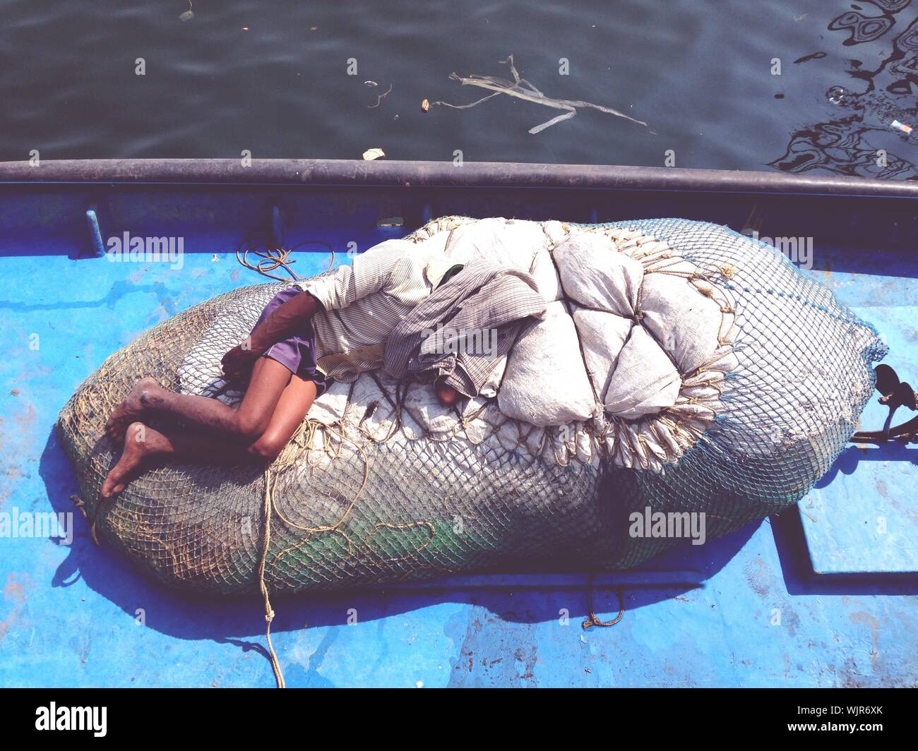 Man sleeping on boat hi-res stock photography and images - Alamy