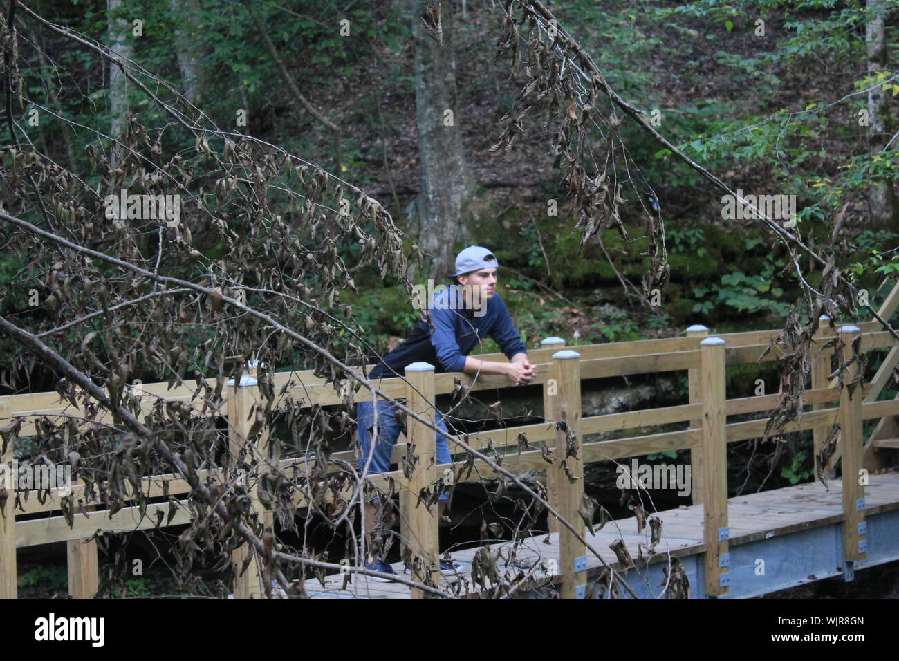 Man leaning railing hi-res stock photography and images - Alamy