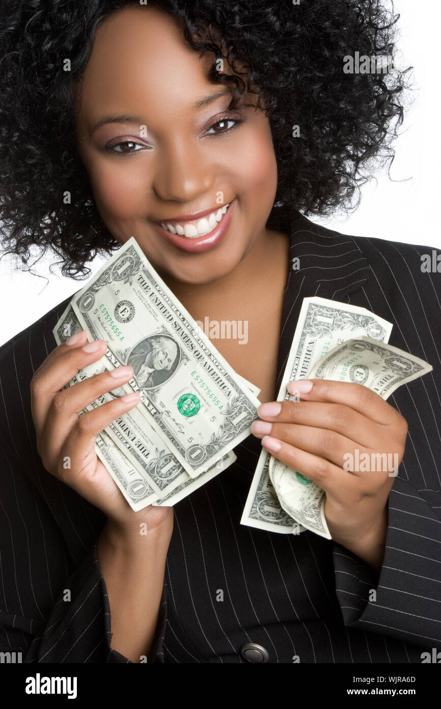 Smiling black woman holding money Stock Photo - Alamy