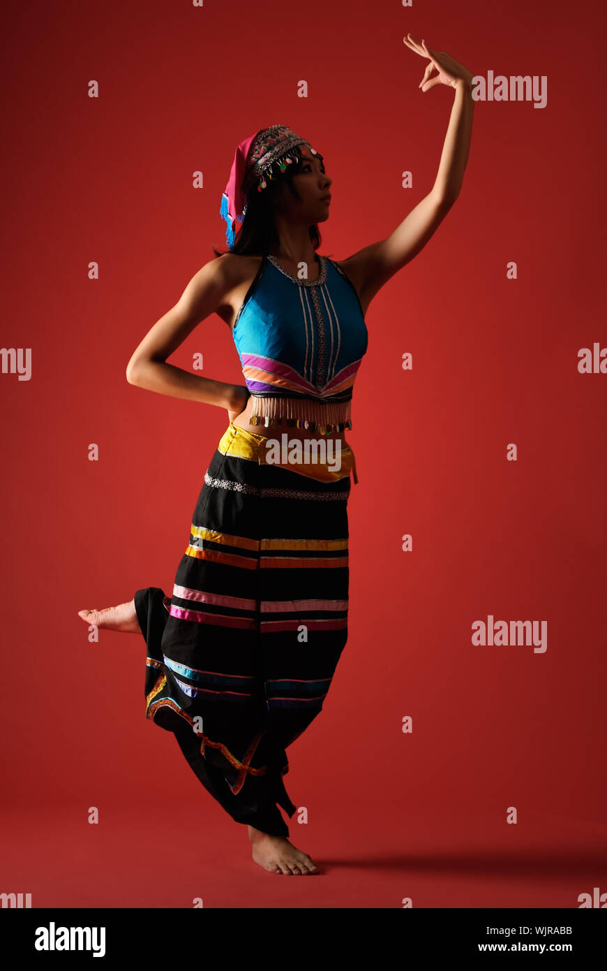 Mysterious traditional dancing of Chinese minority nationality girl ...