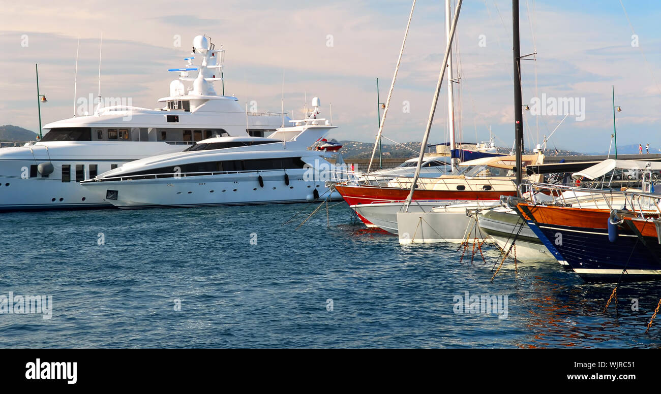 Luxury boats at the dock in St. Tropez in French Riviera Stock Photo ...