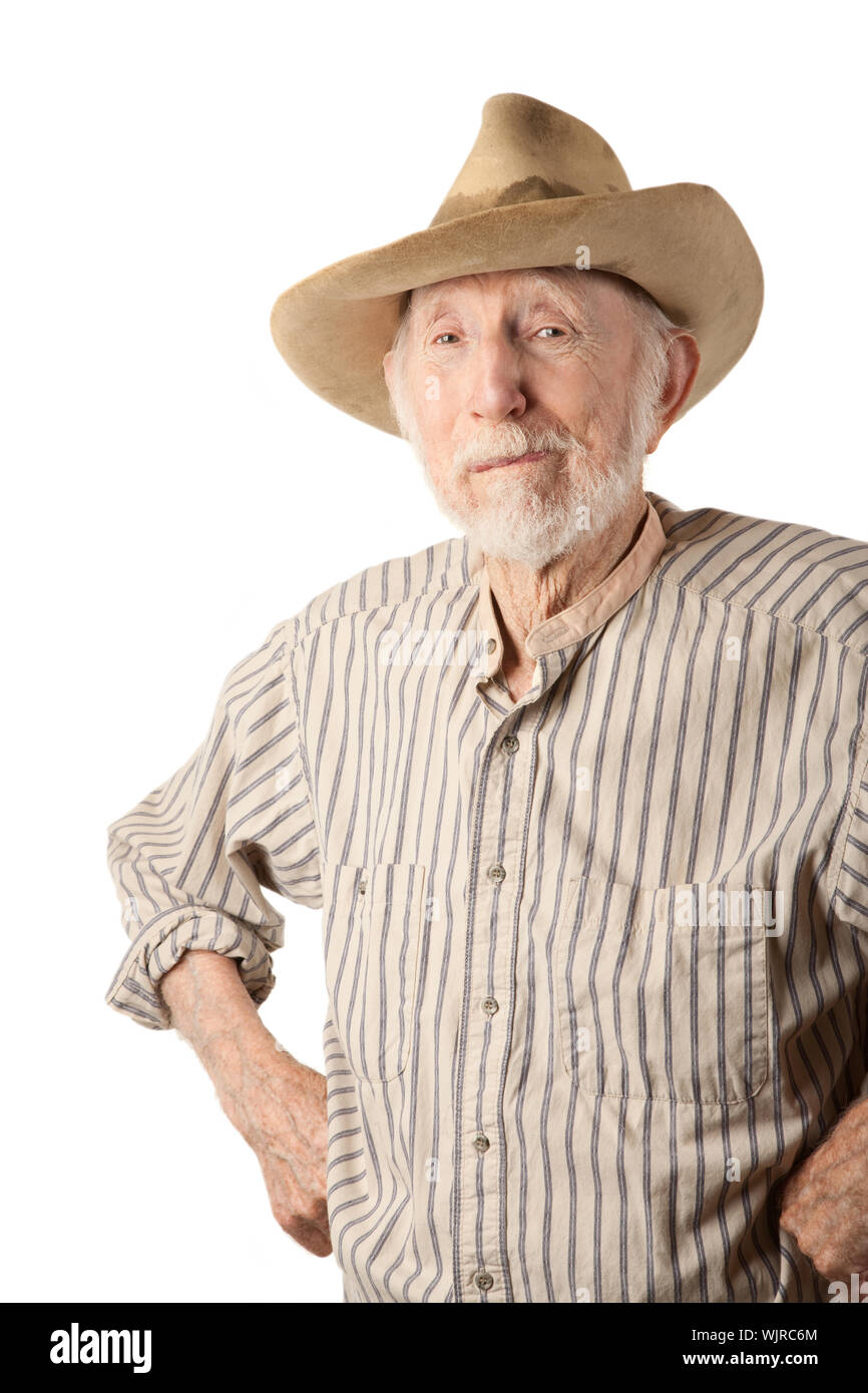 Grungy senior cowboy with a sweat-stained hat Stock Photo - Alamy