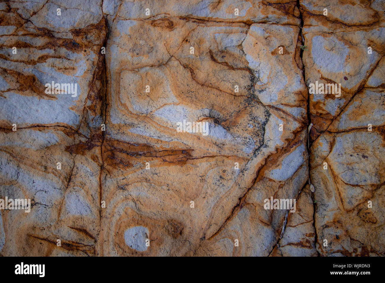 Patterns on the cracked rock Stock Photo - Alamy