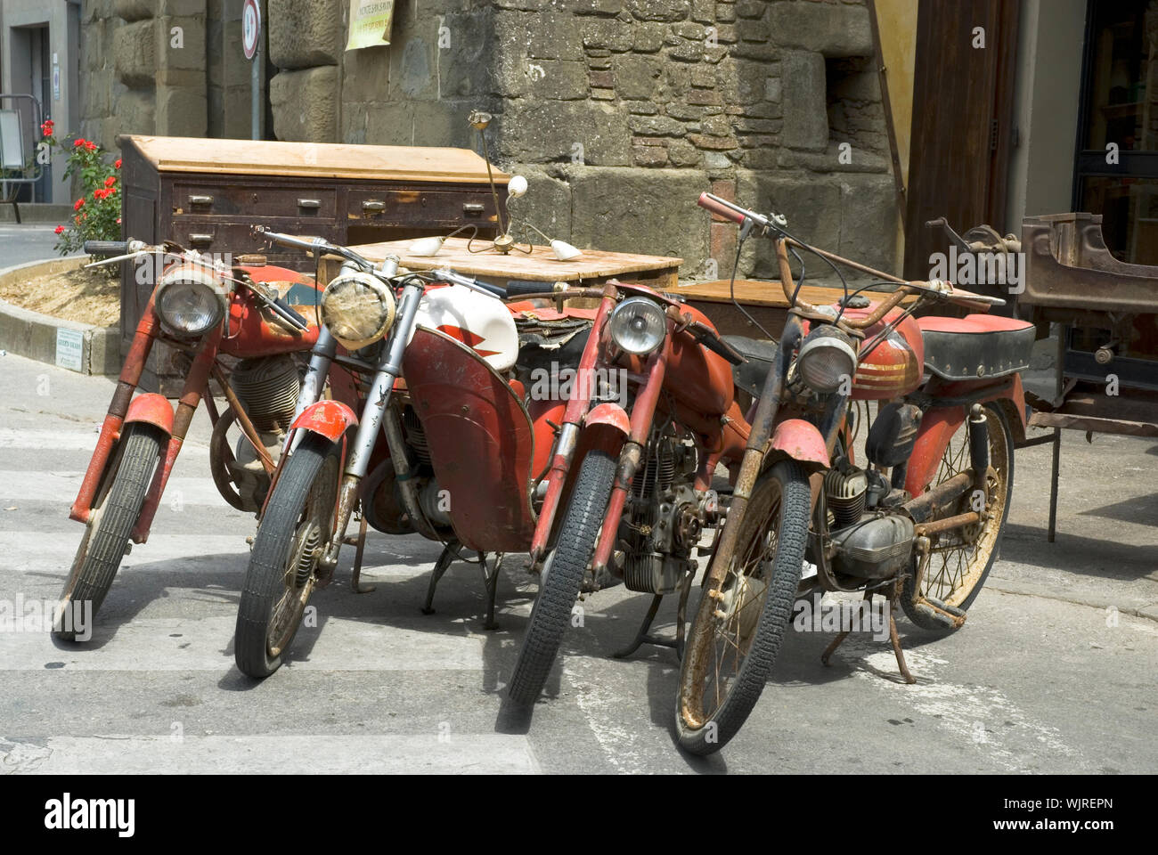 Old mopeds in front of a vintage store Stock Photo - Alamy