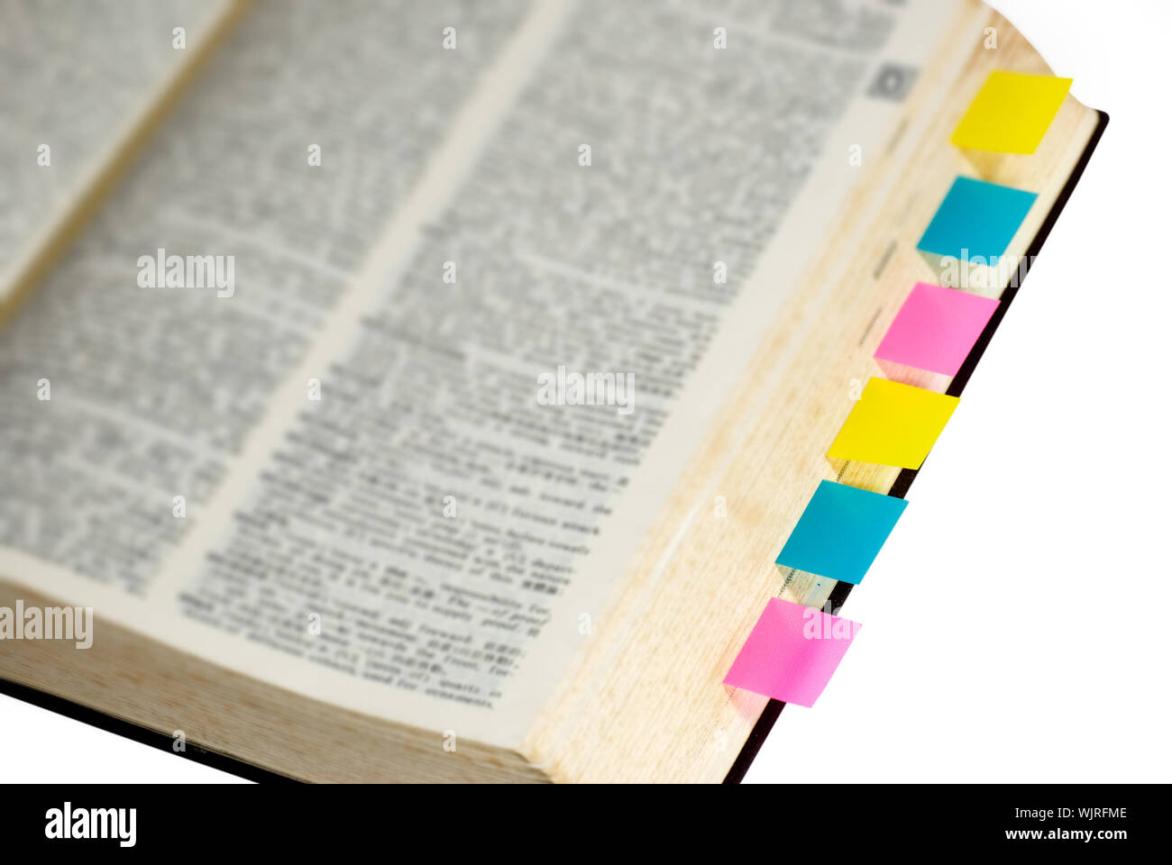 Here are a lot of tags on book pages with white background Stock Photo ...