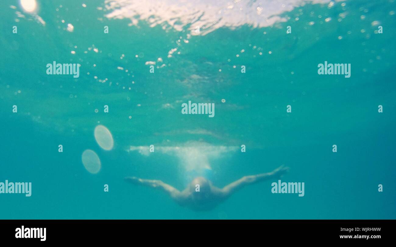 Man swimming under water hi-res stock photography and images - Alamy