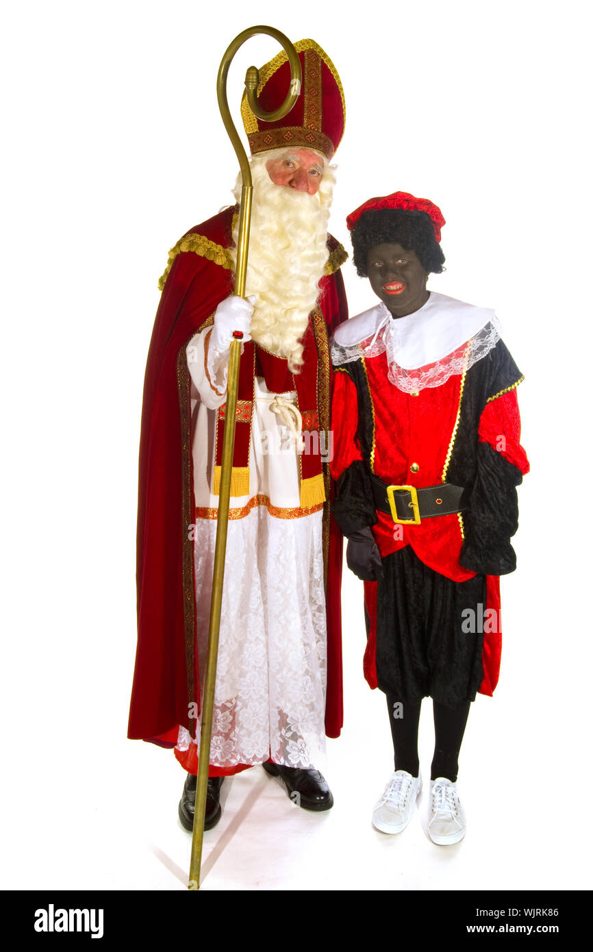 Sinterklaas and Black posing Piet in the studio Stock Photo - Alamy