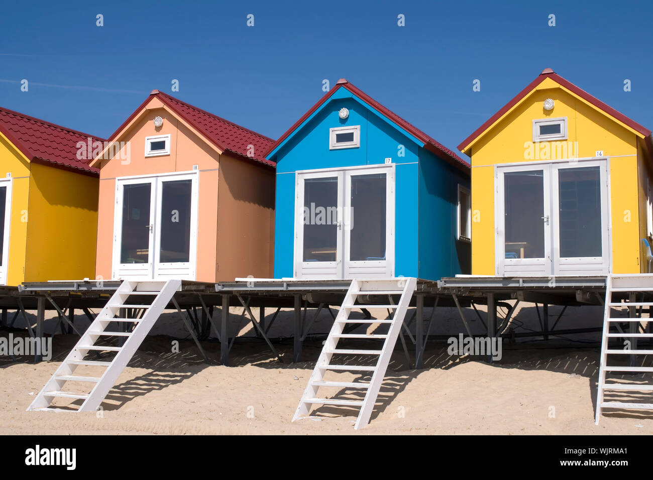 colored houses on the beach Stock Photo - Alamy