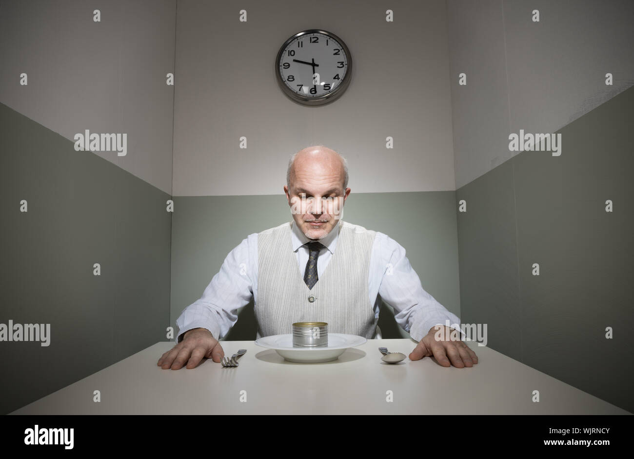 Old man eating dinner alone hi-res stock photography and images - Alamy
