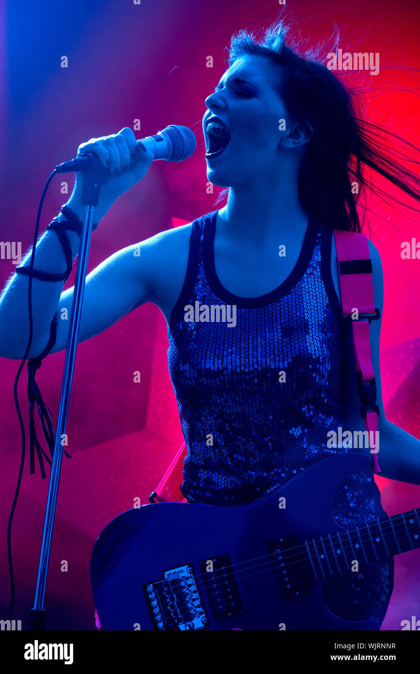 Teenager singing on stage talent show hi-res stock photography and ...