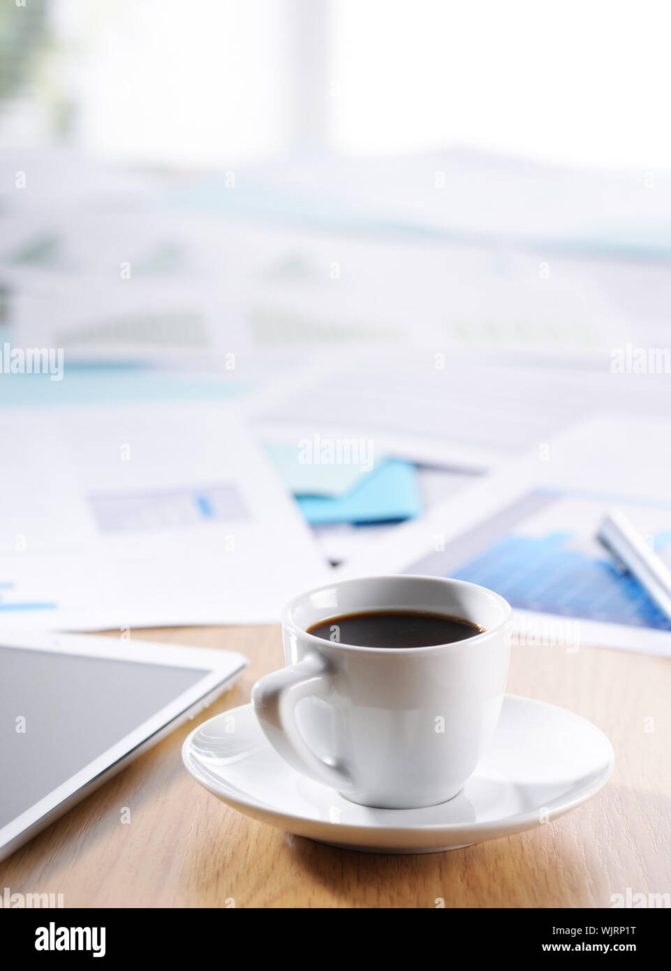 Business Office scene, documents and coffee on desk Stock Photo - Alamy