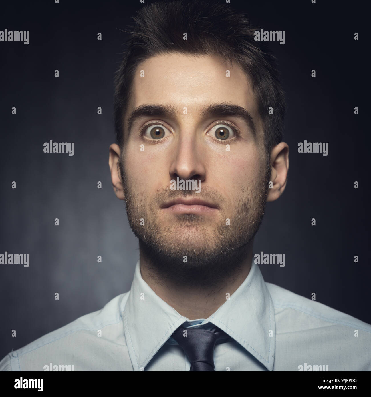 Young emotional man expressing surprise hi-res stock photography and ...